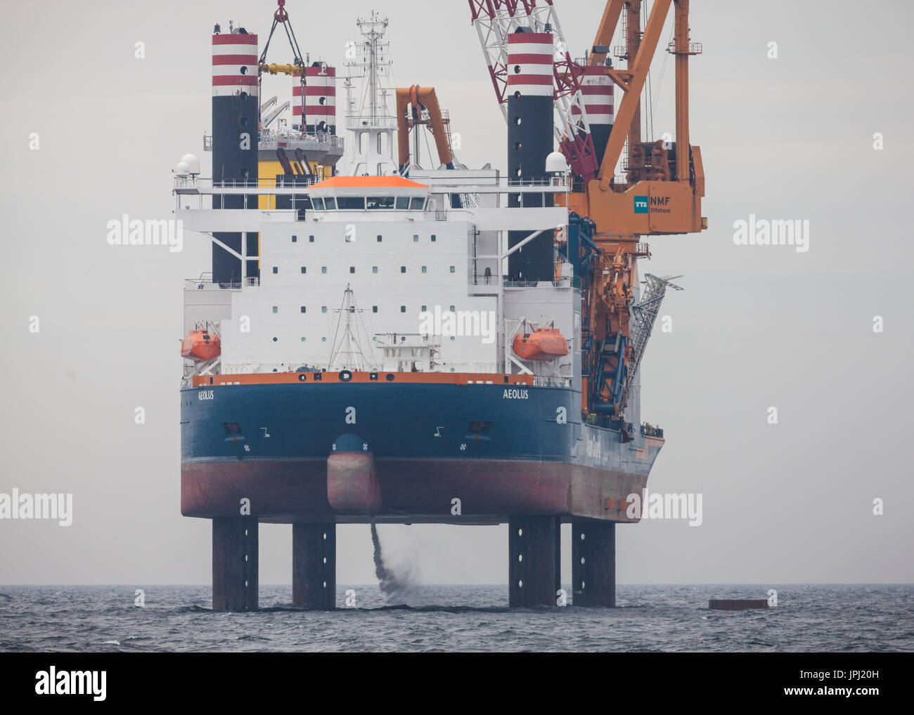 The jack-up vessel, Aeolus, installing the Transition Pieces (TP's) on ...