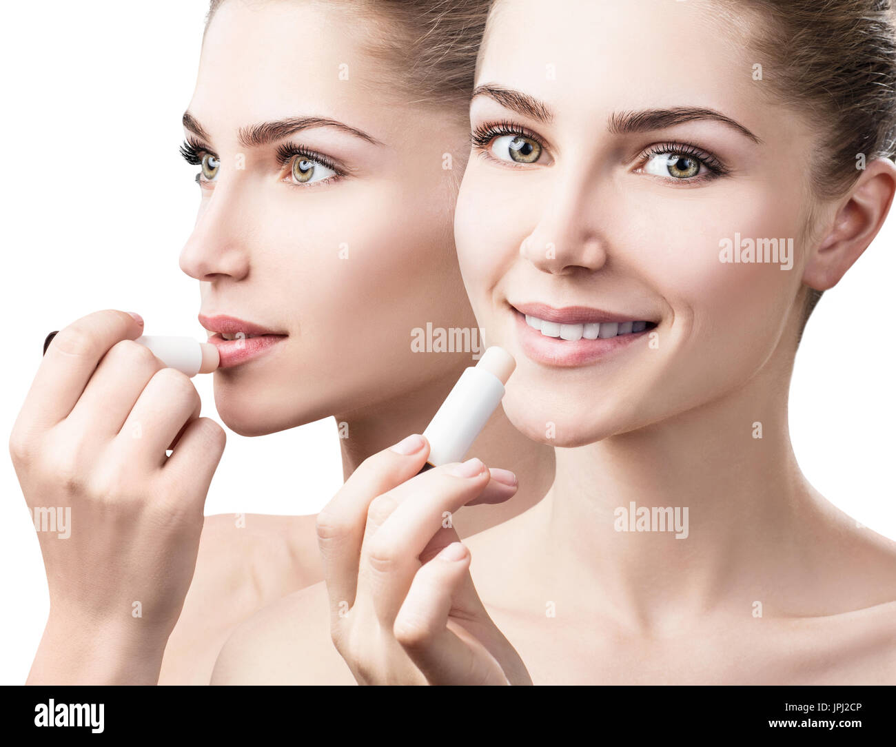 Beautiful woman applying hygienic lip balm Stock Photo - Alamy