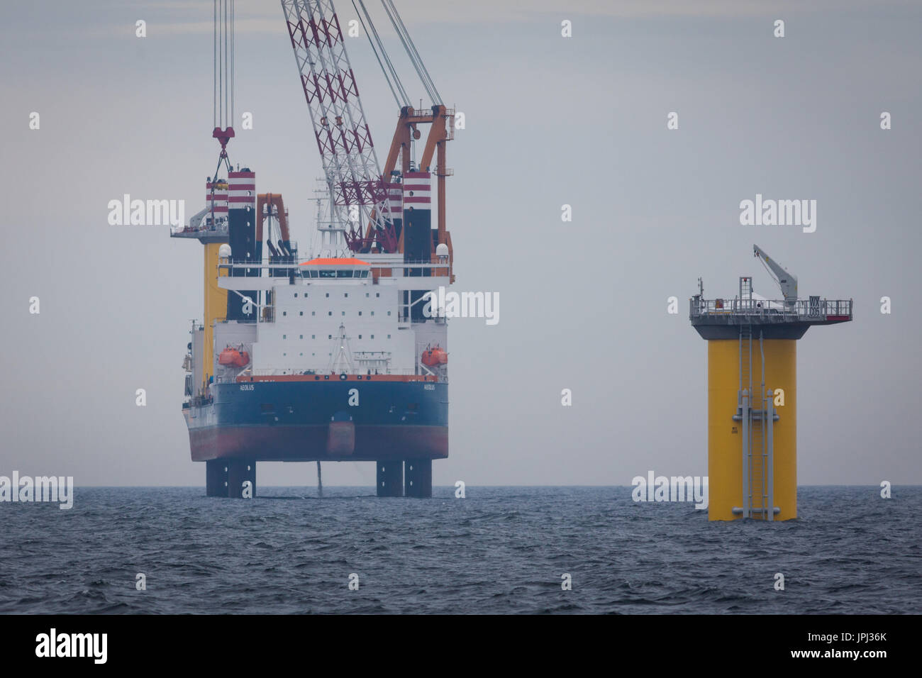 The jack-up vessel, Aeolus, installing the Transition Pieces (TP's) on ...