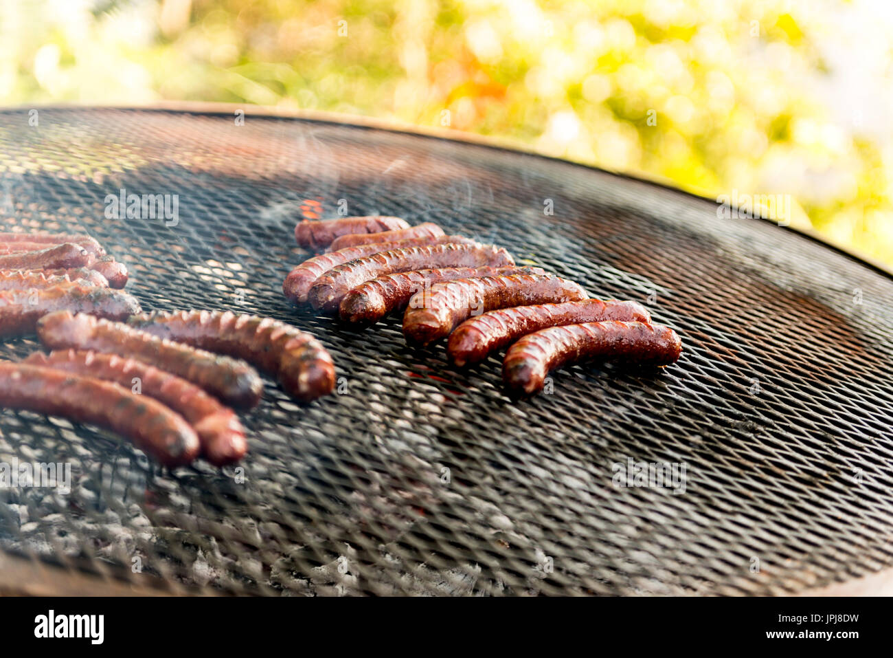 hot dogs cooking on open fire Stock Photo - Alamy