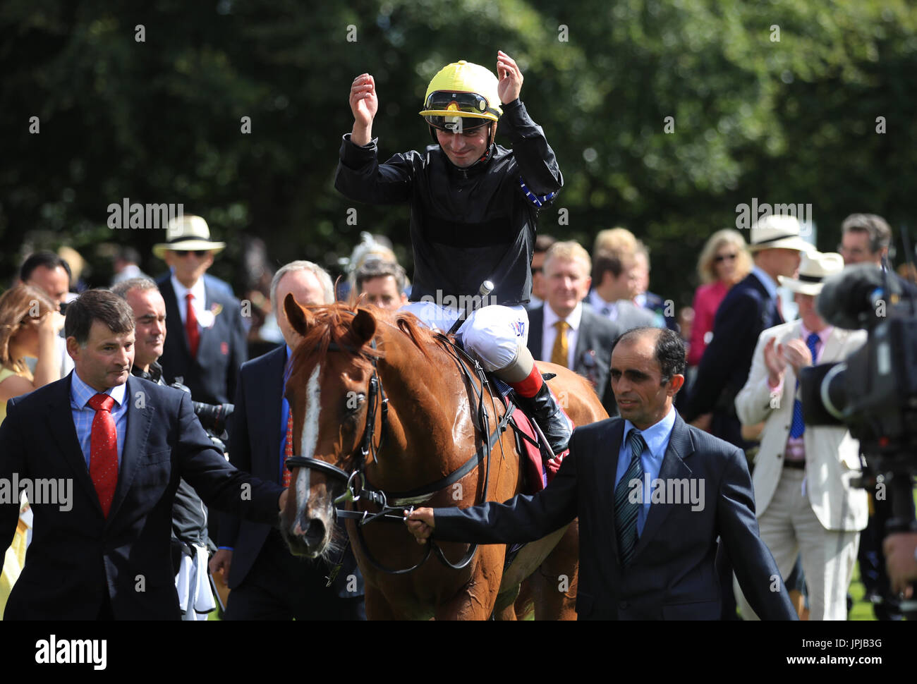 Jockey Andrea Atzeni celebrates on Stradivarius after winning the Qatar ...