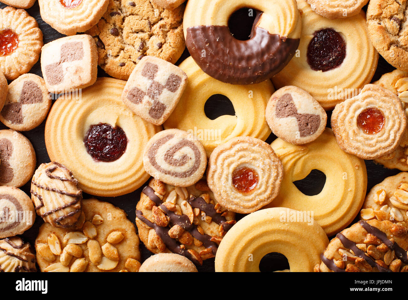 Background of cookies assorted close-up. Horizontal view from above ...