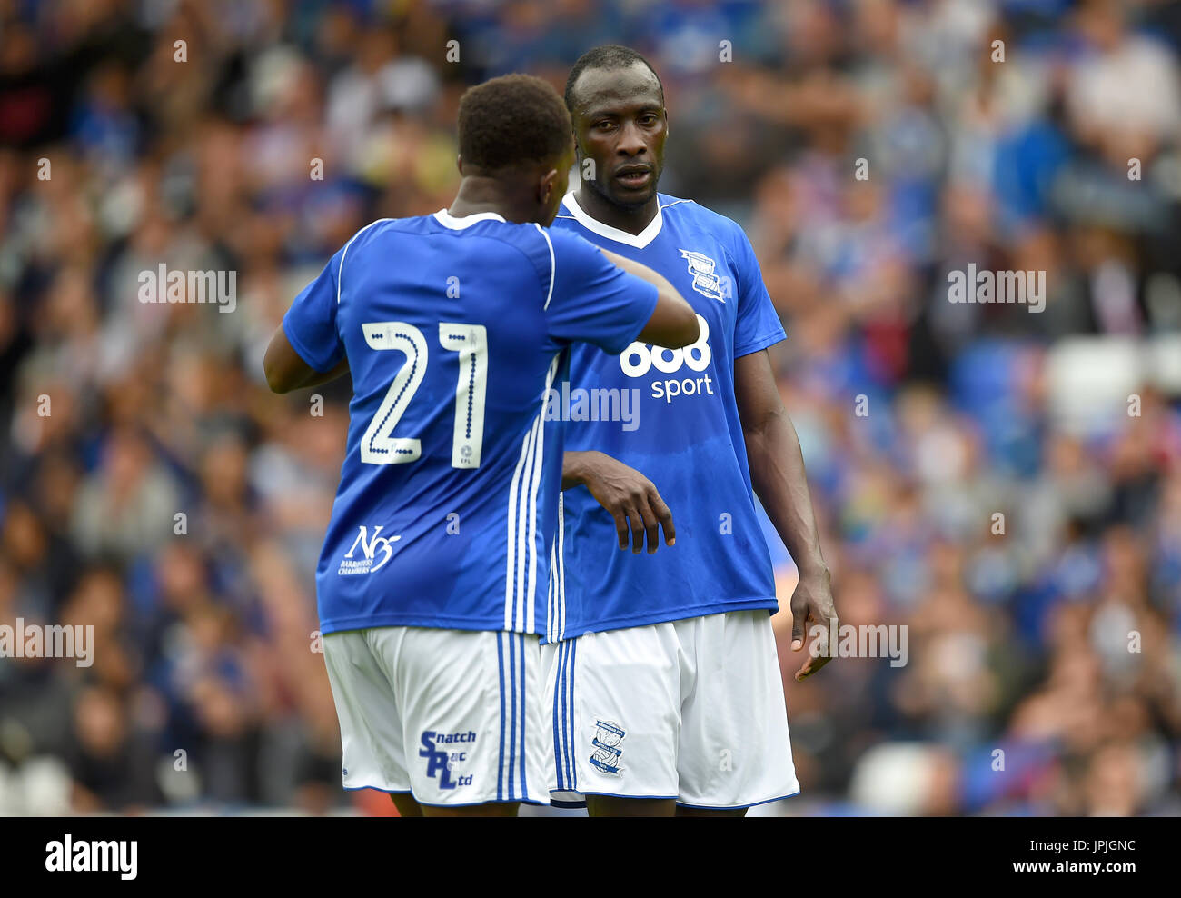 Birmingham City's Cheikh Ndoye (right) talks to teammate Wes Harding ...