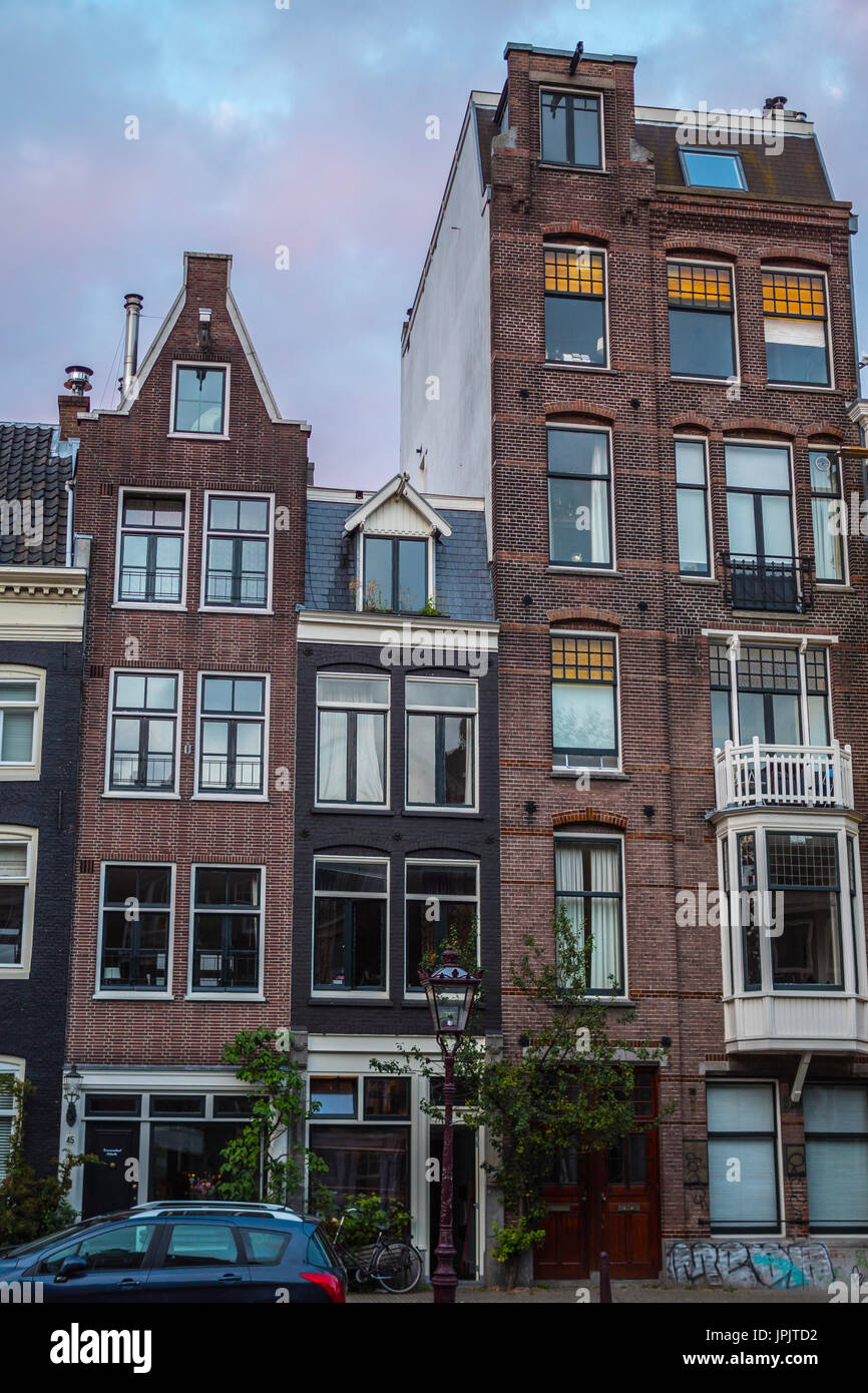 Typical buildings in the historic district of Amsterdam along the ...