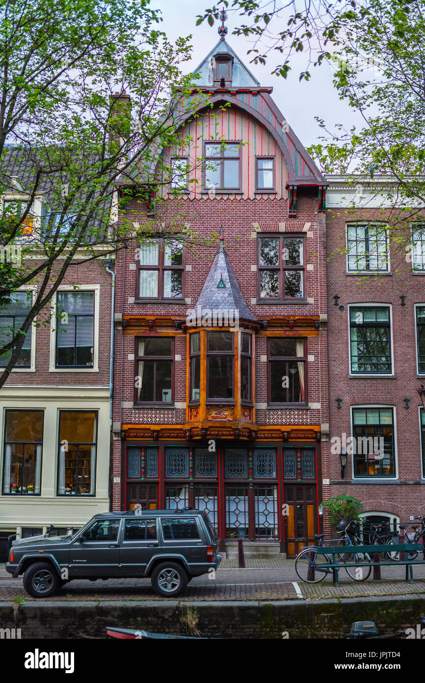 Typical buildings in the historic district of Amsterdam along the ...