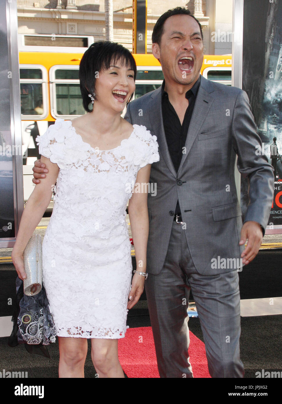 Ken Watanabe and guest at Los Angeles Premiere of "INCEPTION" held at ...
