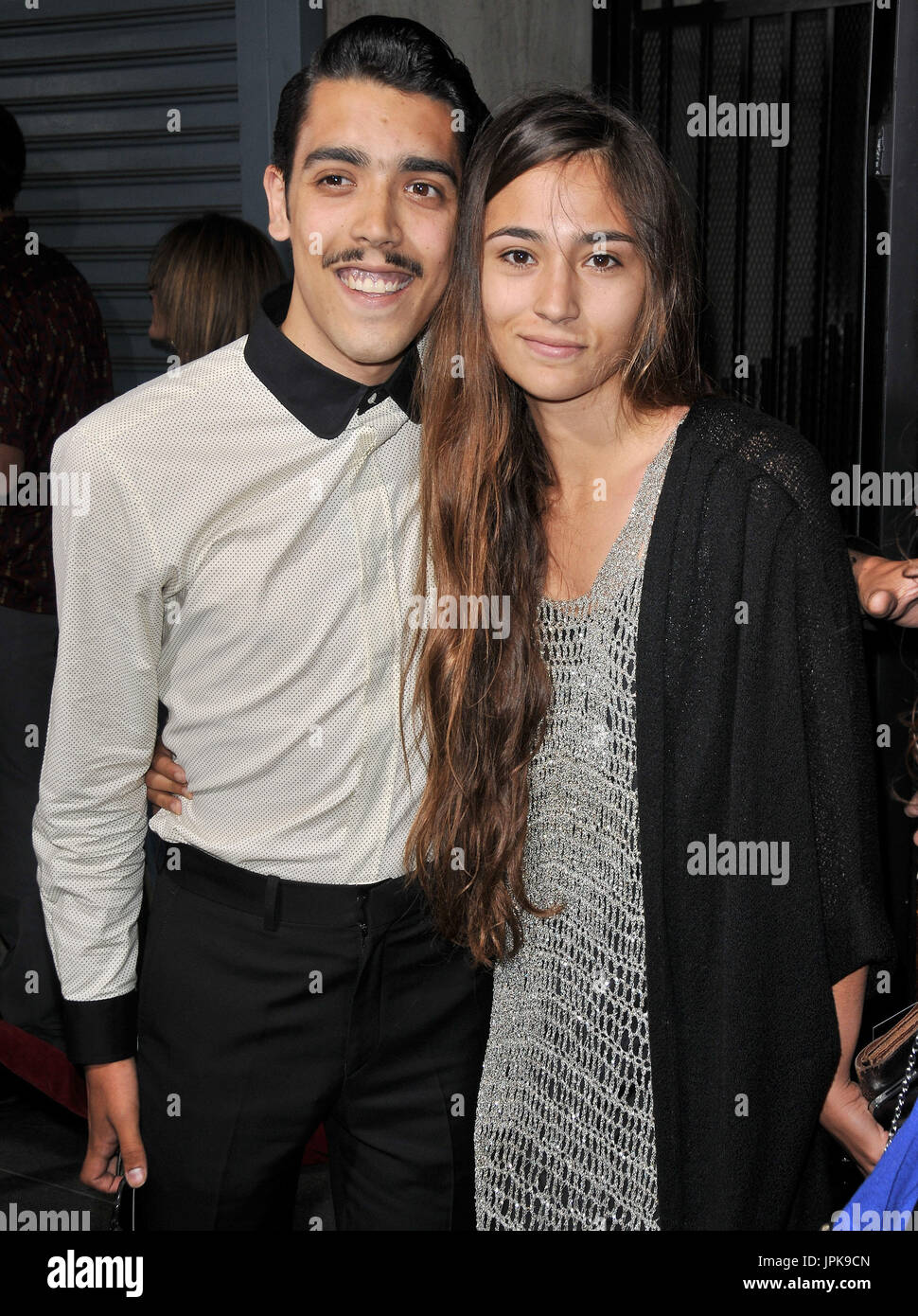 Gilbert Trejo & Guest at the Los Angeles Screening of "Machete" held at ...