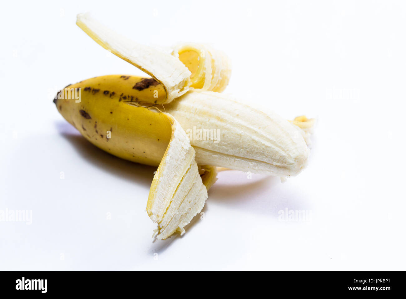 Little peeled yellow banana hi-res stock photography and images - Alamy