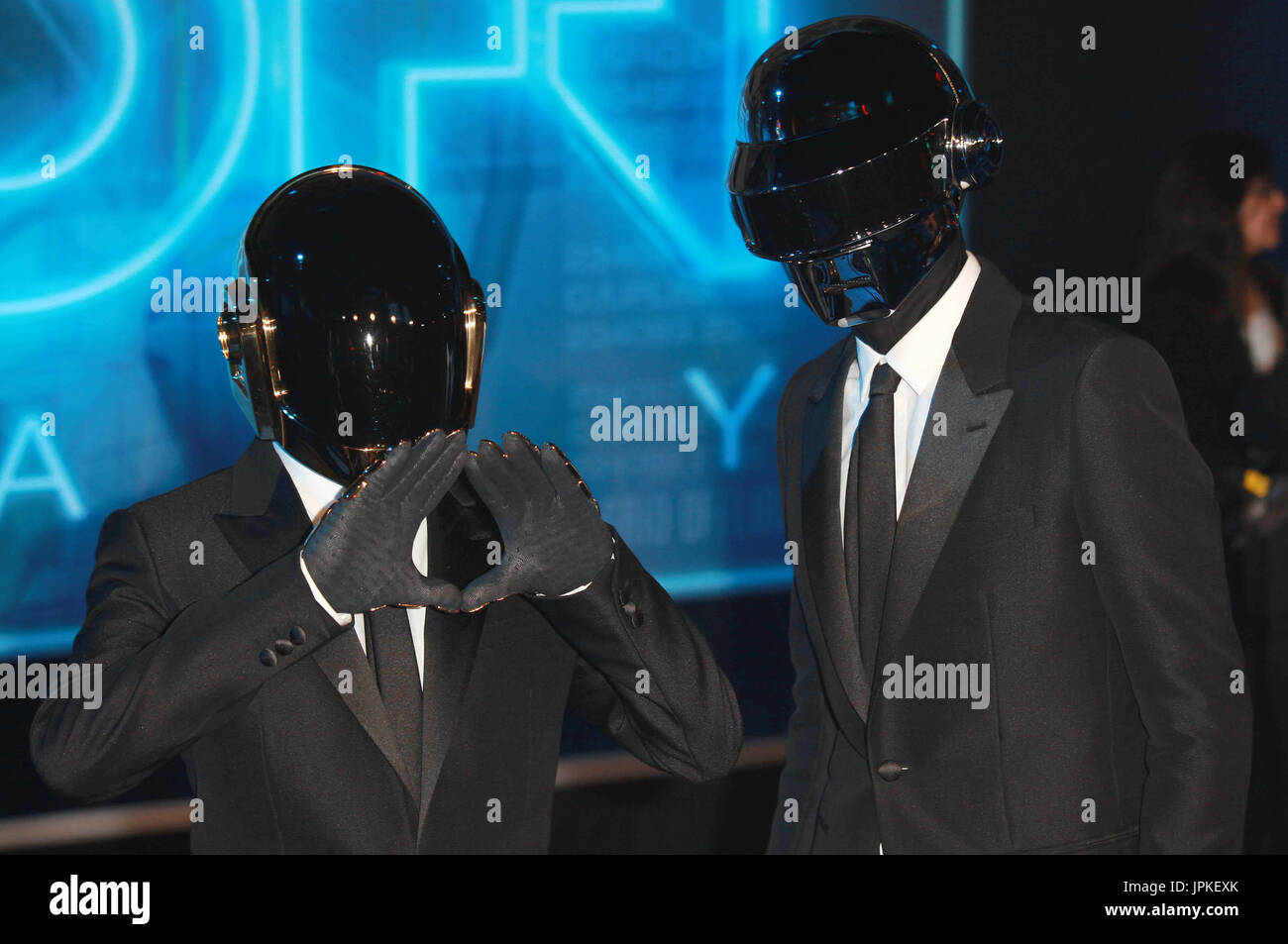 Daft Punk arrive at the world premiere for Walt Disney's "Tron: Legacy ...