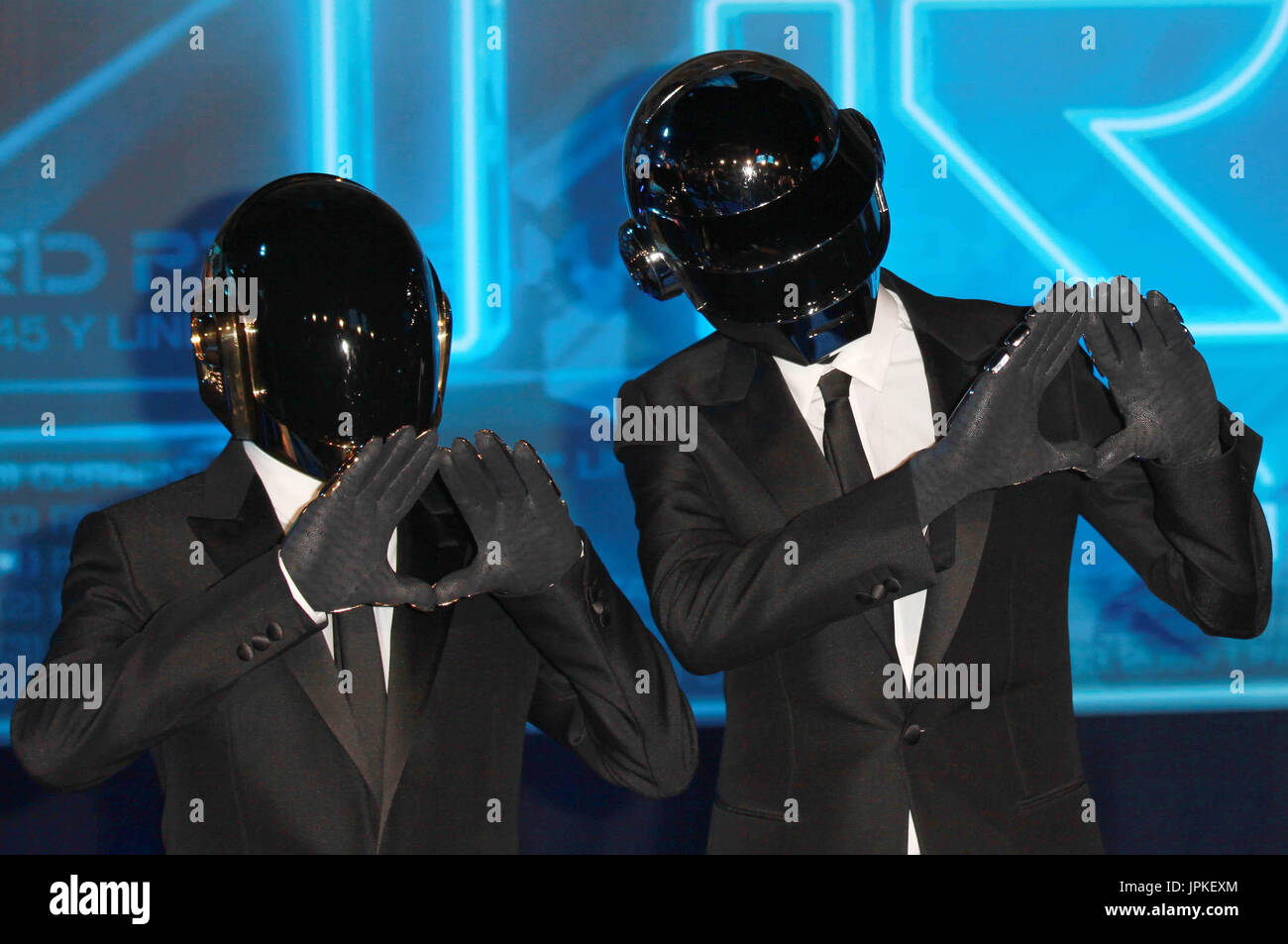 Daft Punk arrive at the world premiere for Walt Disney's "Tron: Legacy ...