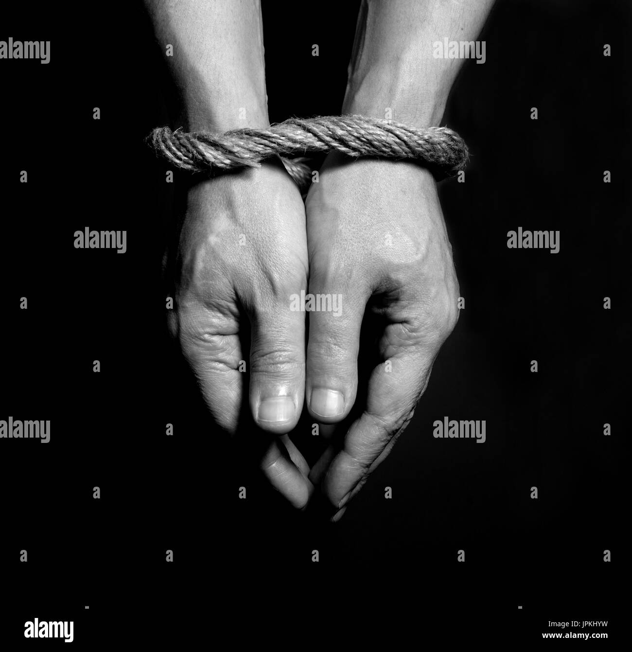 Rope handcuffs hi-res stock photography and images - Alamy