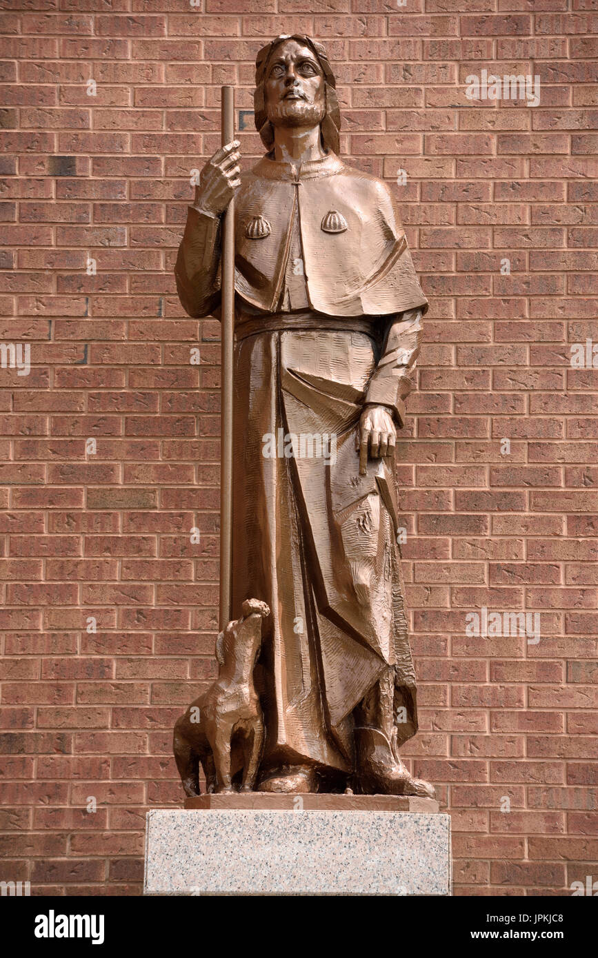 Statue of Saint Roch with injured leg and dog that brought him bread ...