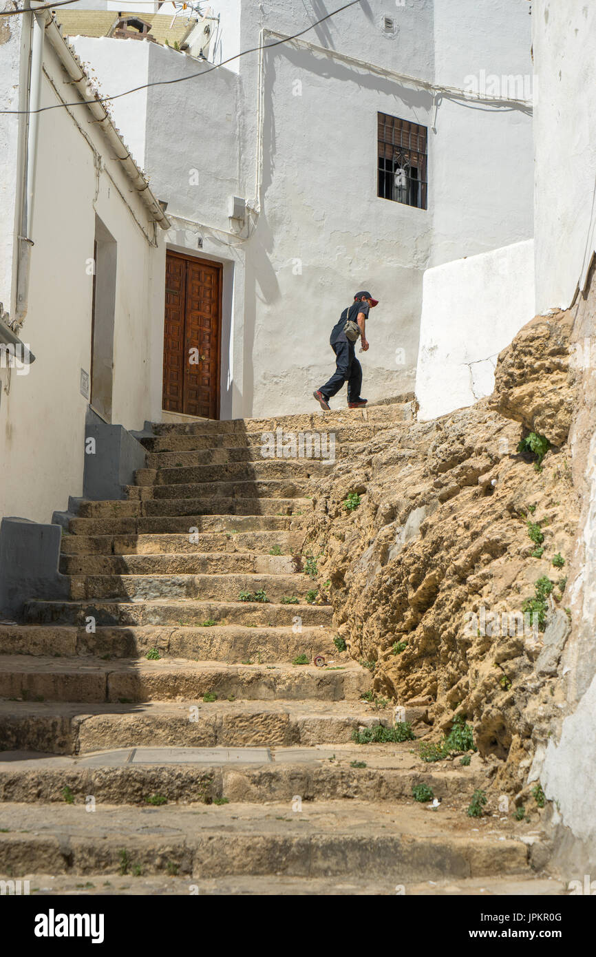 Man climbing stairs, Ronda, Spain Stock Photo - Alamy