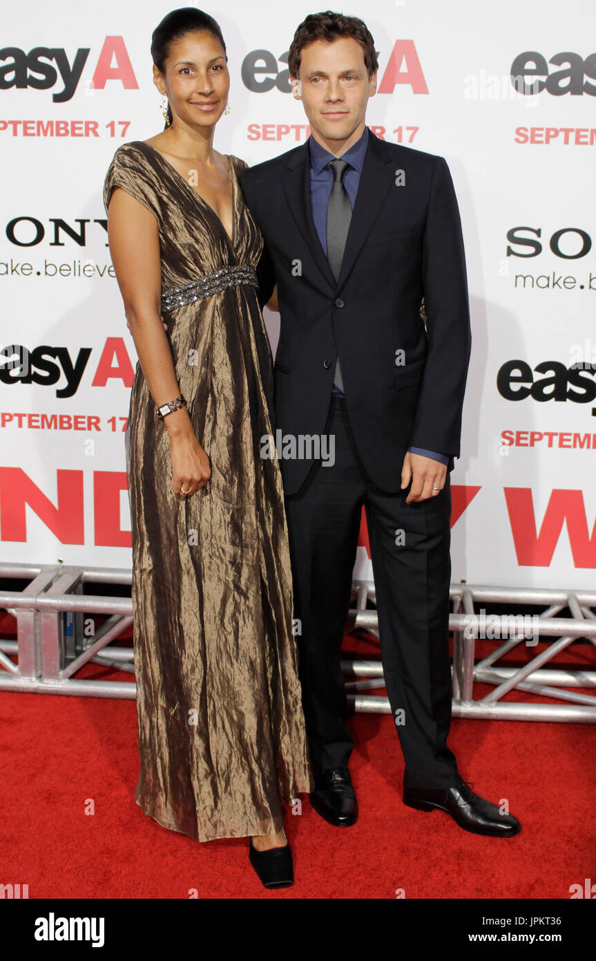 Director Will Gluck & Guest at the Los Angeles Premiere of "Easy A ...