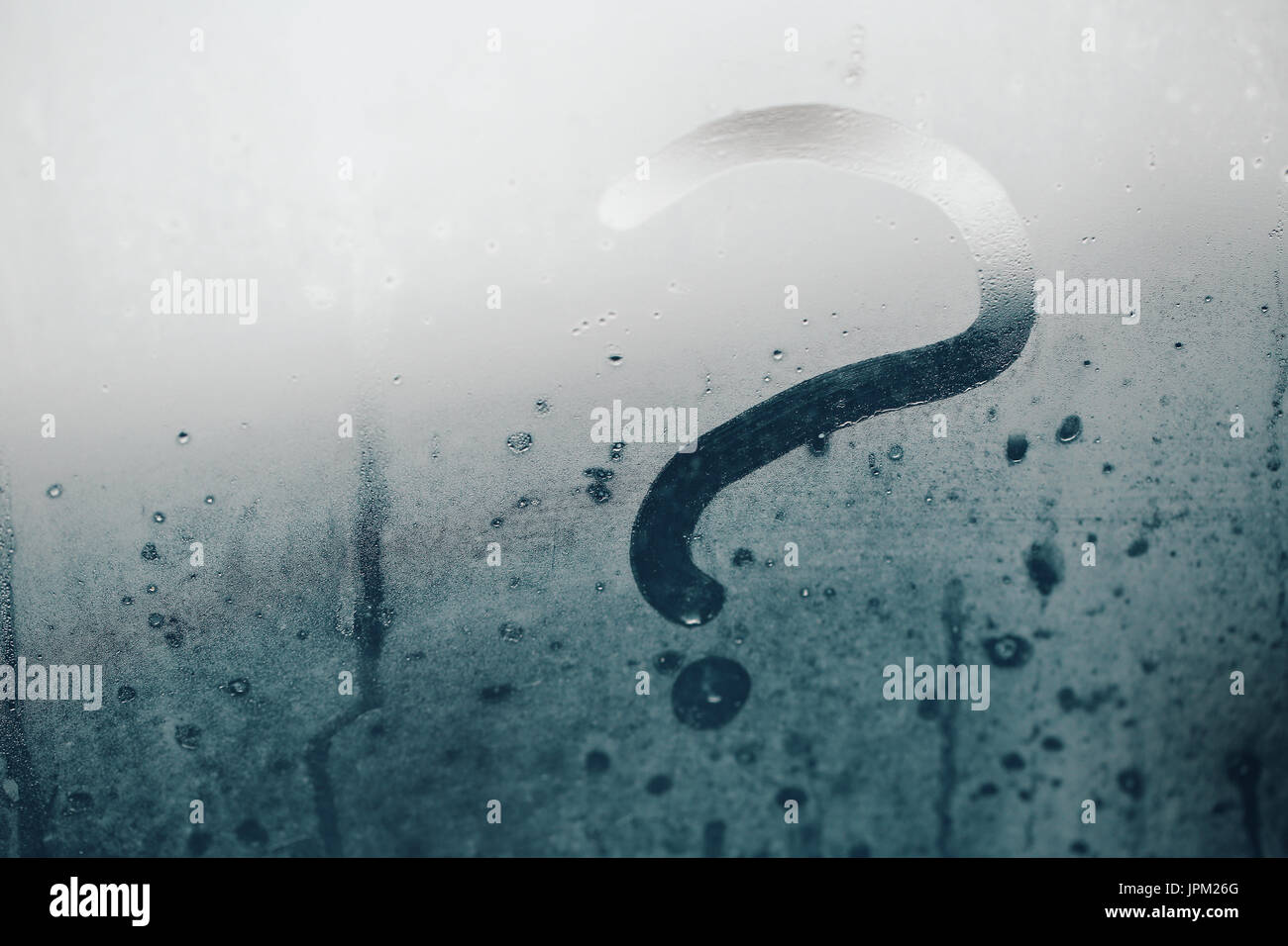 question mark on the misted window Stock Photo - Alamy