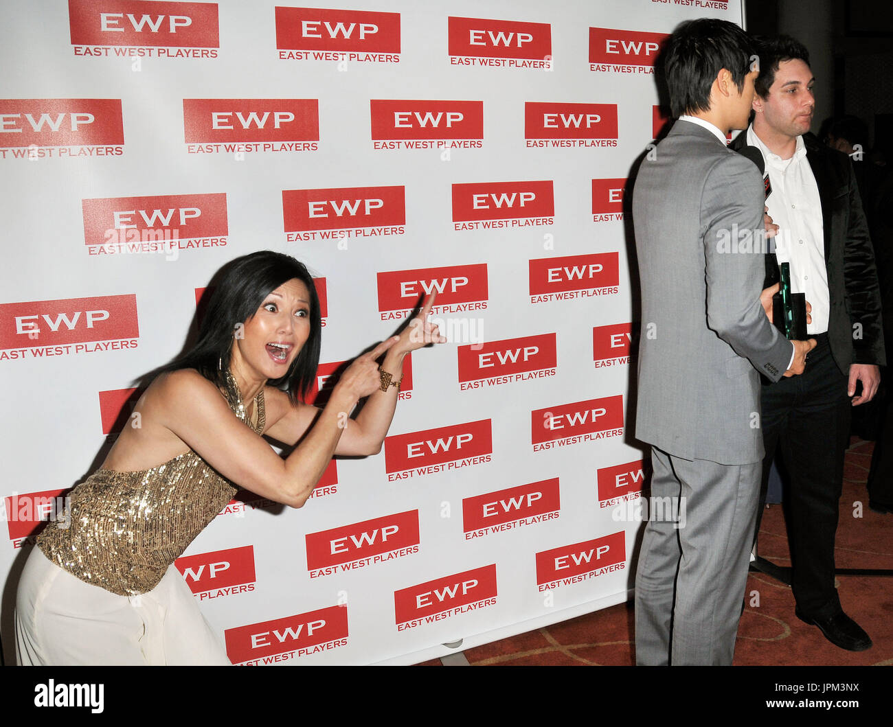Tamlyn Tomita was excited to be by Harry Shum, Jr. while he was being ...