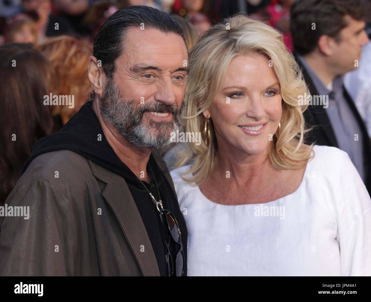 Actor Ian McShane and Gwen Humble arrive at the world premiere for Walt ...