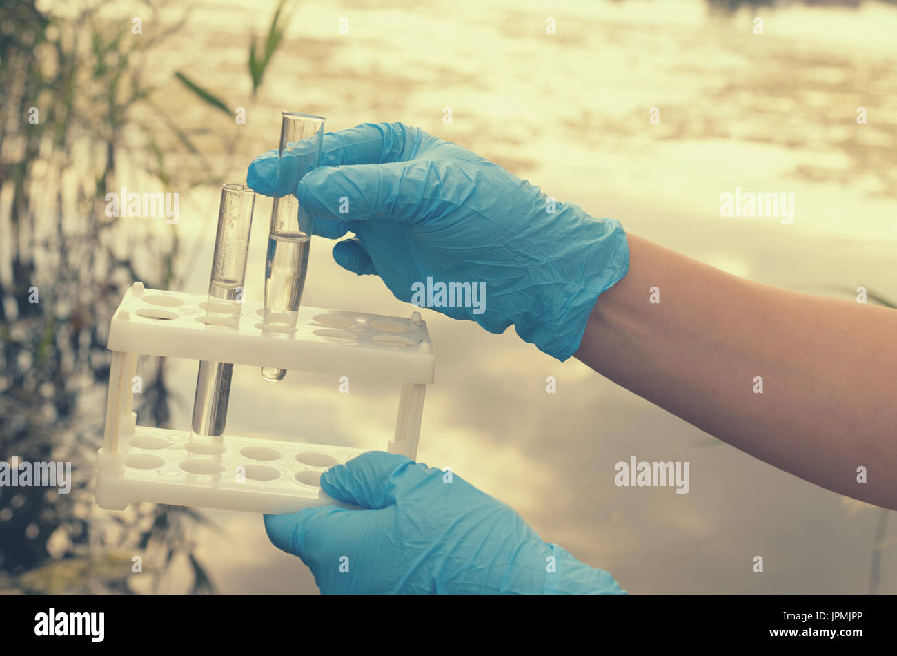 Taking a water test for analysis from a reservoir Stock Photo - Alamy