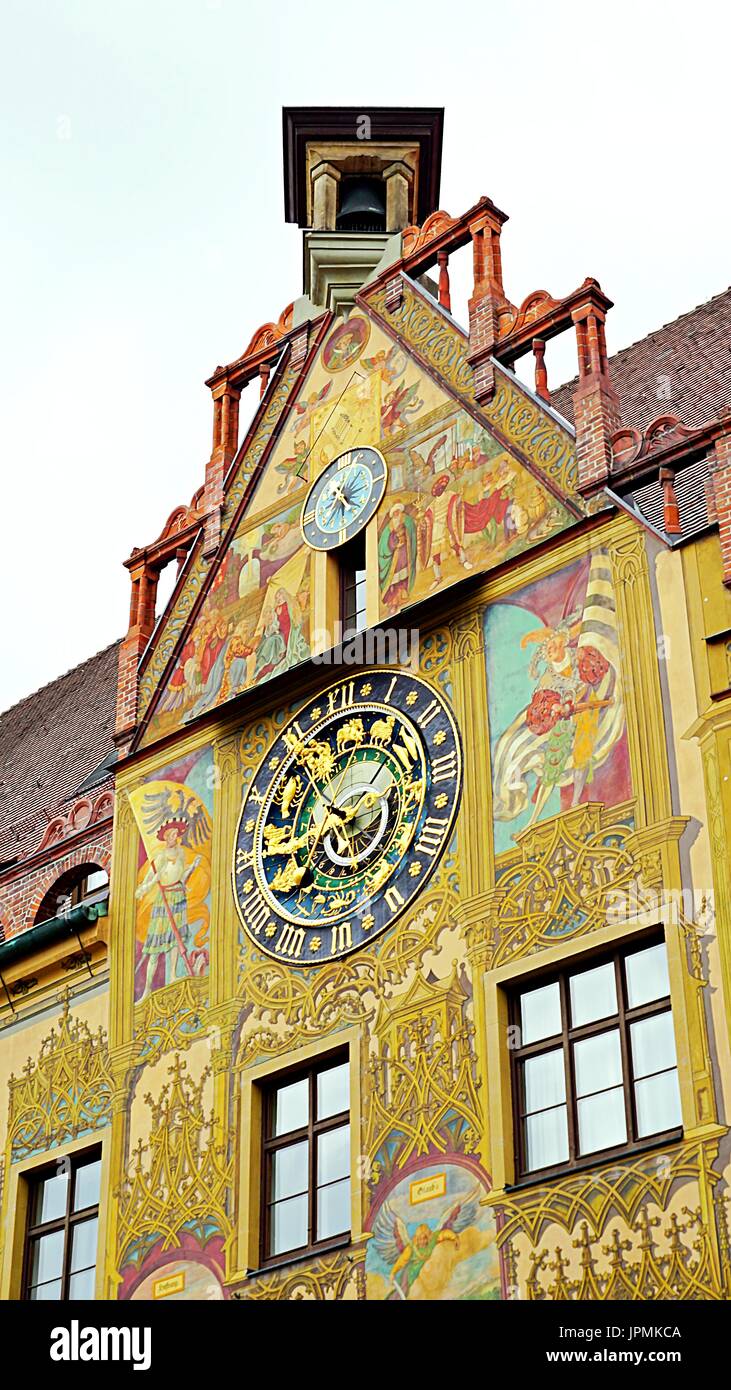 Astronomical clock on the wall of Ulm City Hall building, Ulm, Germany ...