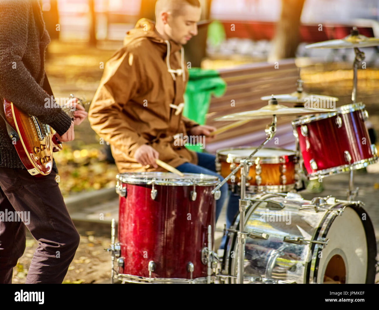 Festival music band. Friends playing on percussion instruments city ...