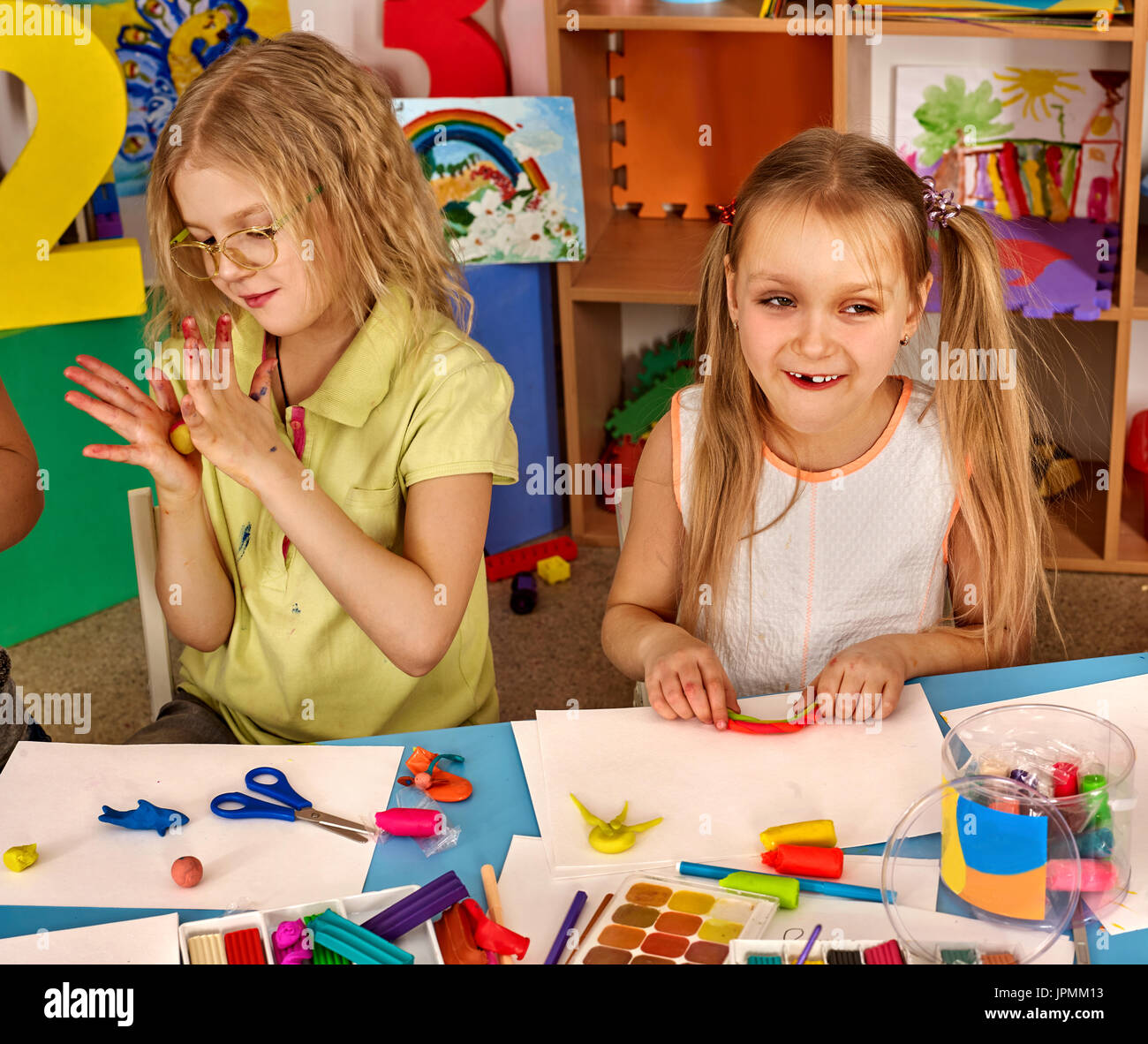 Plasticine modeling clay in children class in school Stock Photo - Alamy