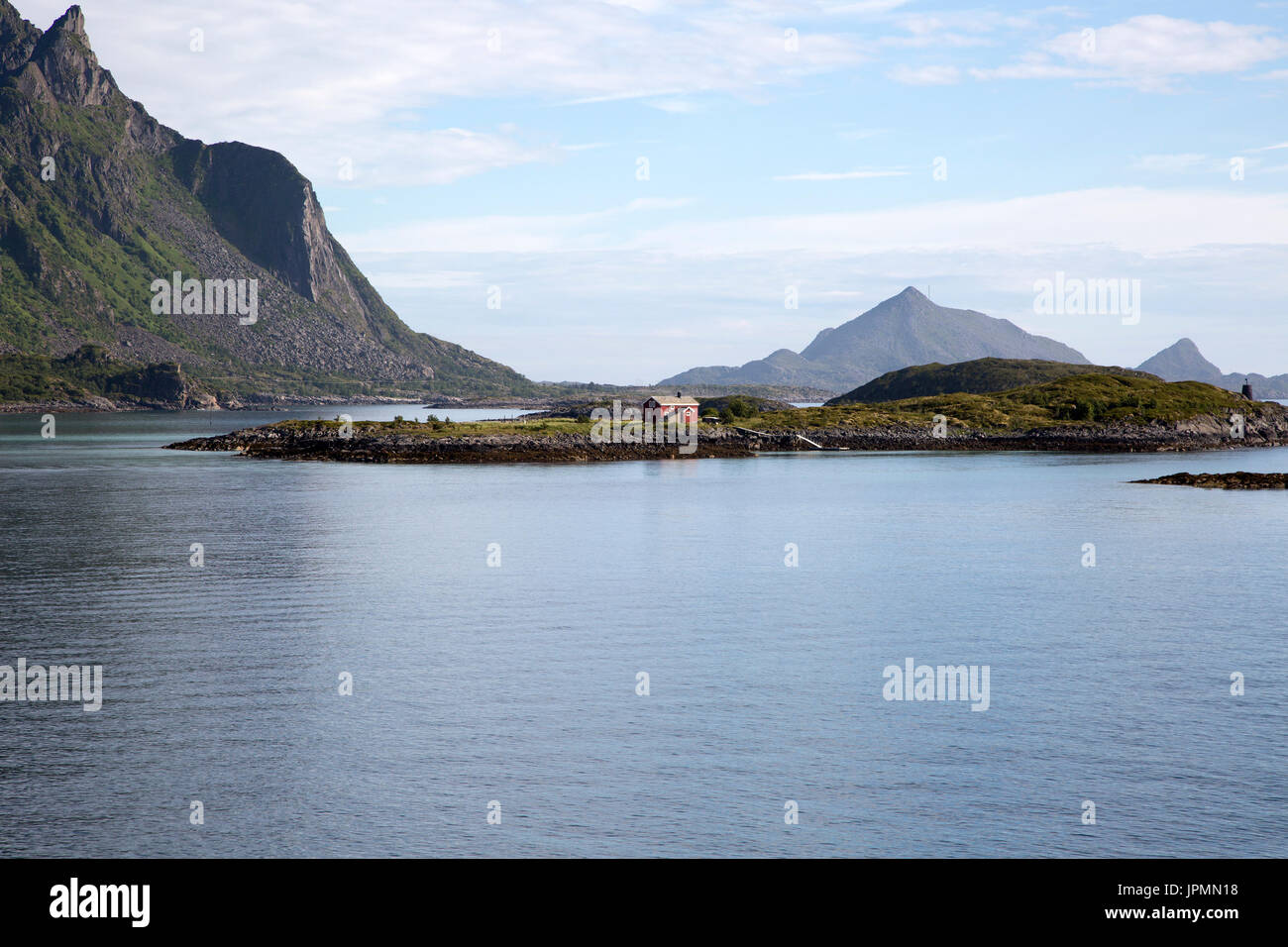 Farmhouse on small skerry island near Stormolla island, Lofoten islands ...