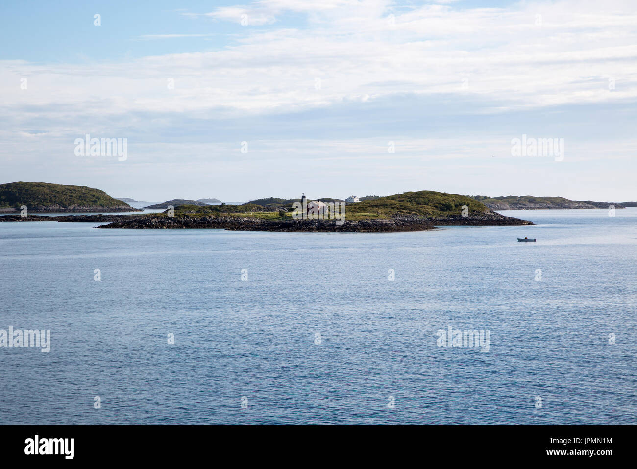 Farmhouse on small skerry island near Stormolla island, Lofoten islands ...