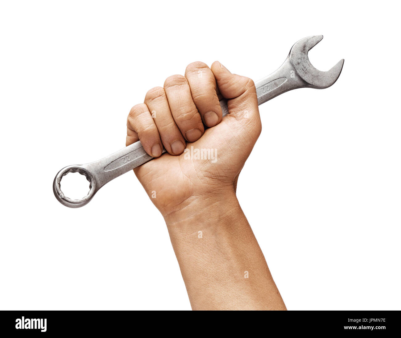 Man's hand holds a wrench isolated on white background. Close up. High ...