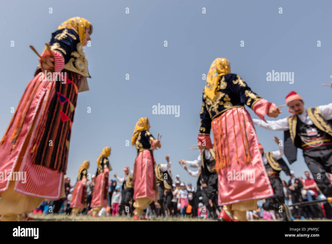 Unidentified people playing traditional folklore with their ethnic ...