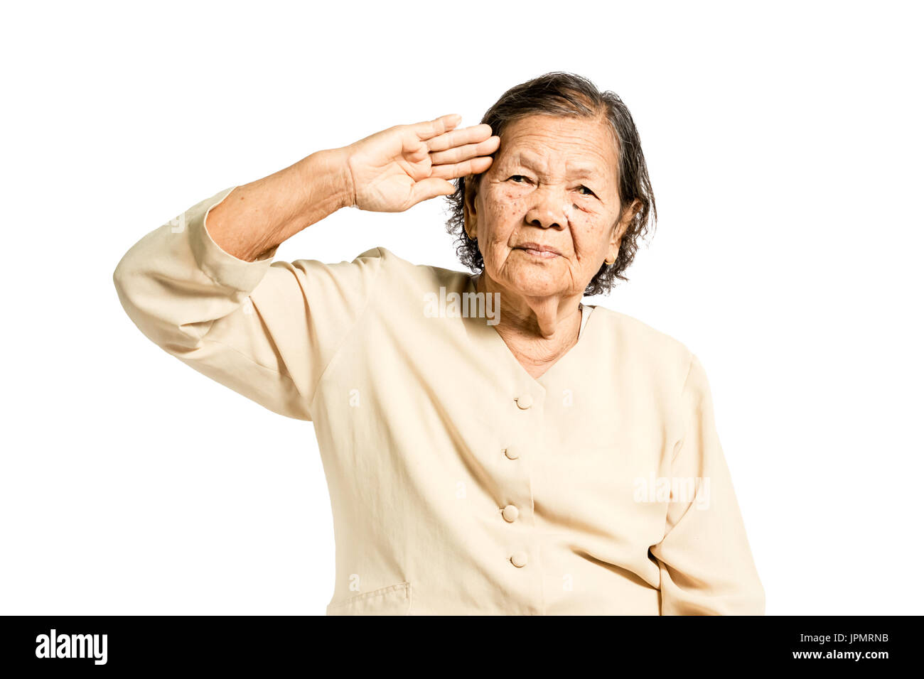 Portrait of a mature woman smiling and showing salute hand. Isolated on ...