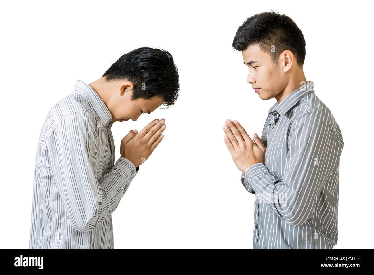 Portrait of two asian business man smiling and pay respect. isolated on ...