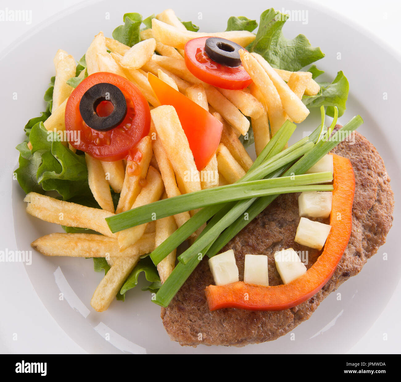 children meal, french fries with meat and vegetables Stock Photo - Alamy