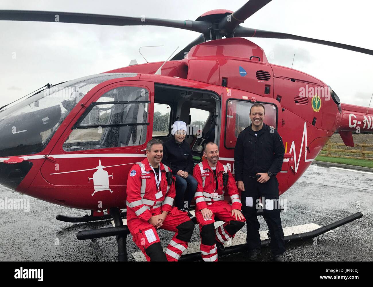 Conor McMullan, 11, is reunited with the air ambulance crew (left to ...