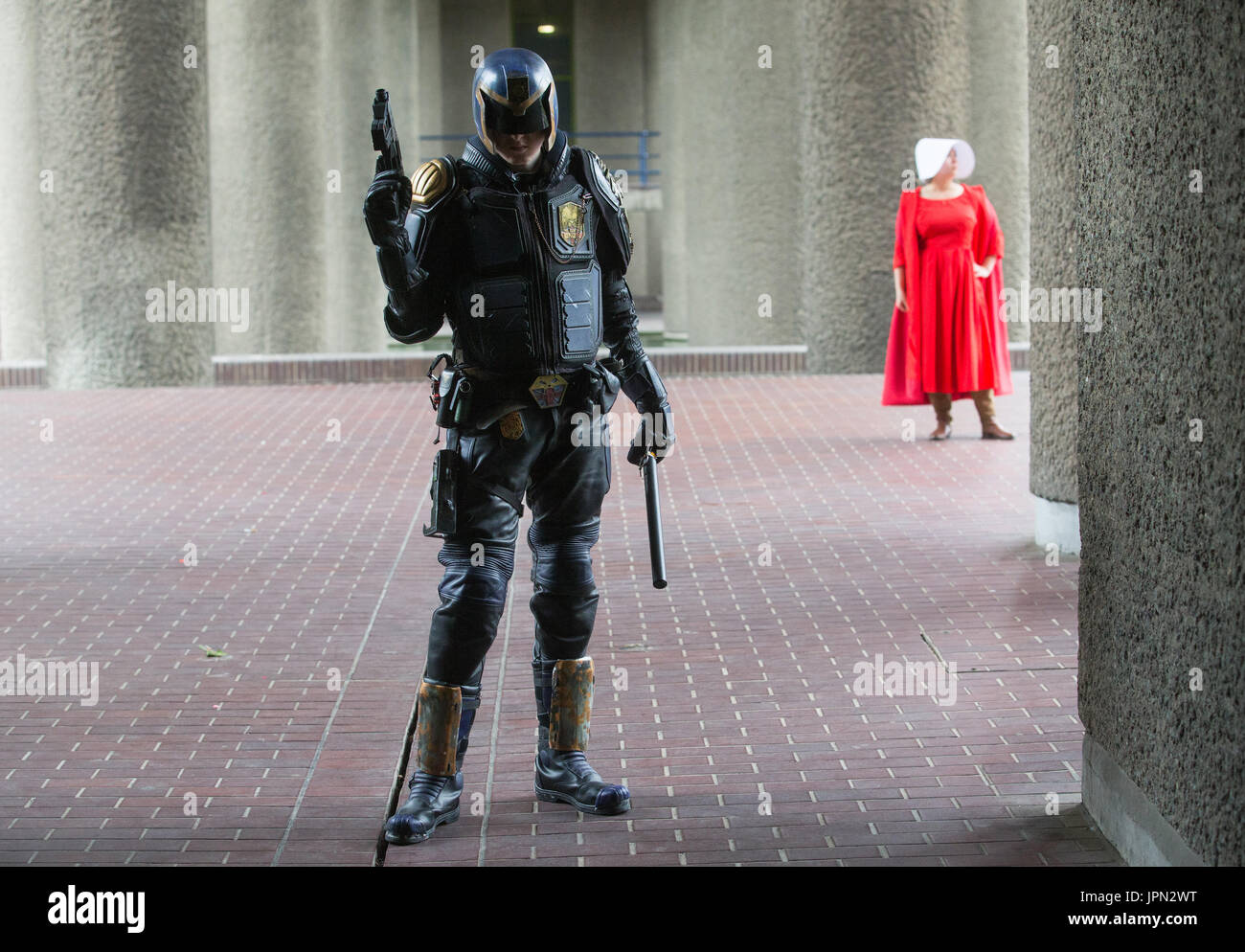 William Conley, dressed as Enza from Judge Dredd and Mai Fox as Offred ...