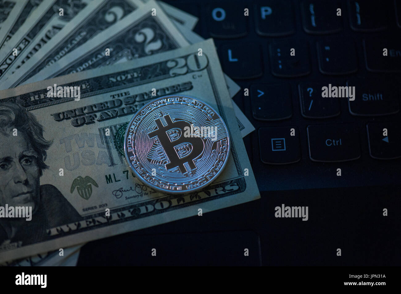 Bitcoin coin with dollars Stock Photo - Alamy