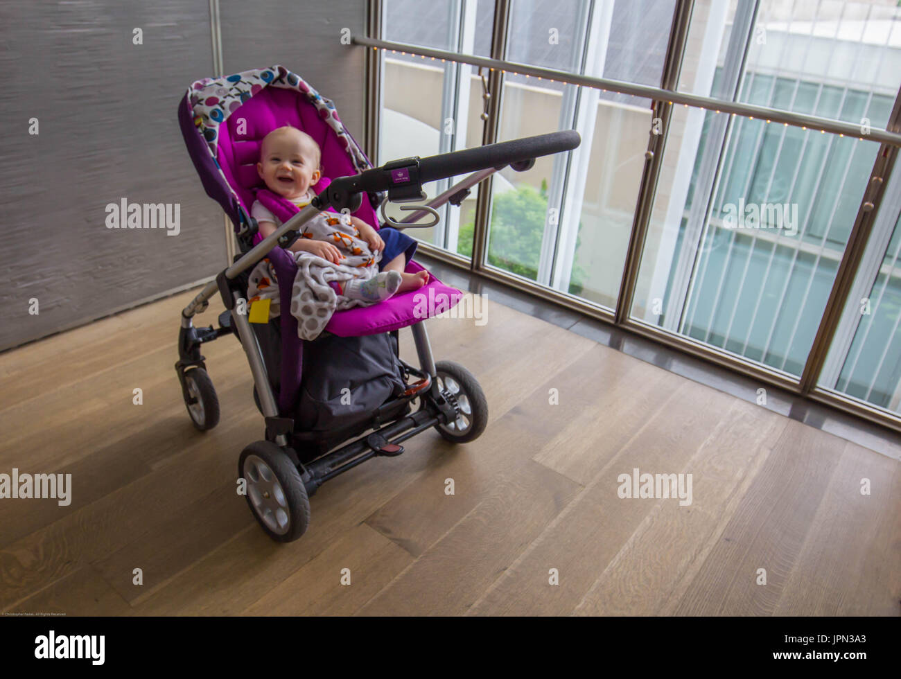 happy baby in a stroller Stock Photo - Alamy