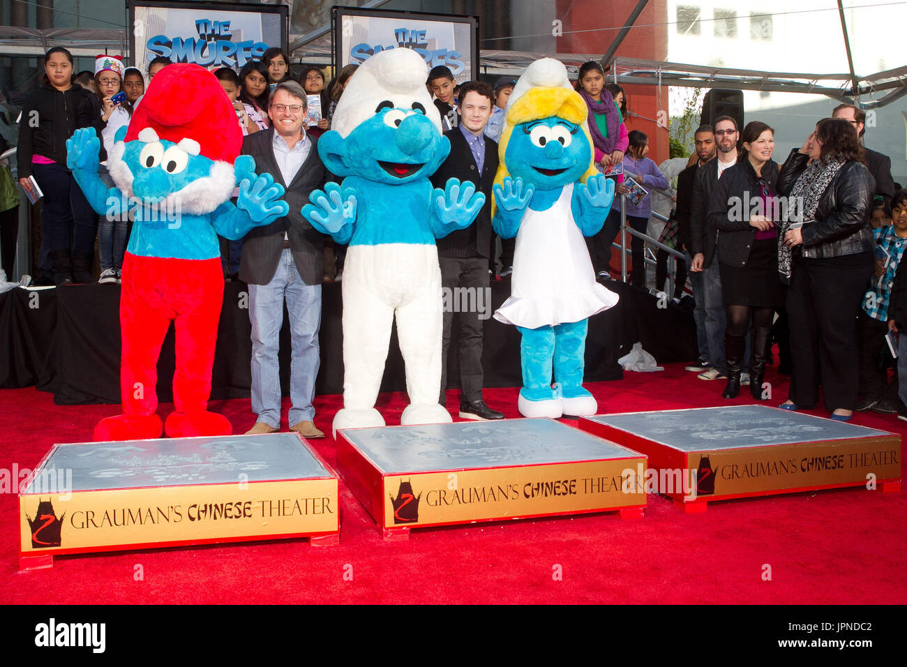 Papa Smurf, Bob Osher, Clumsy, Anton Yelchin & Smurfette at The Smurfs ...