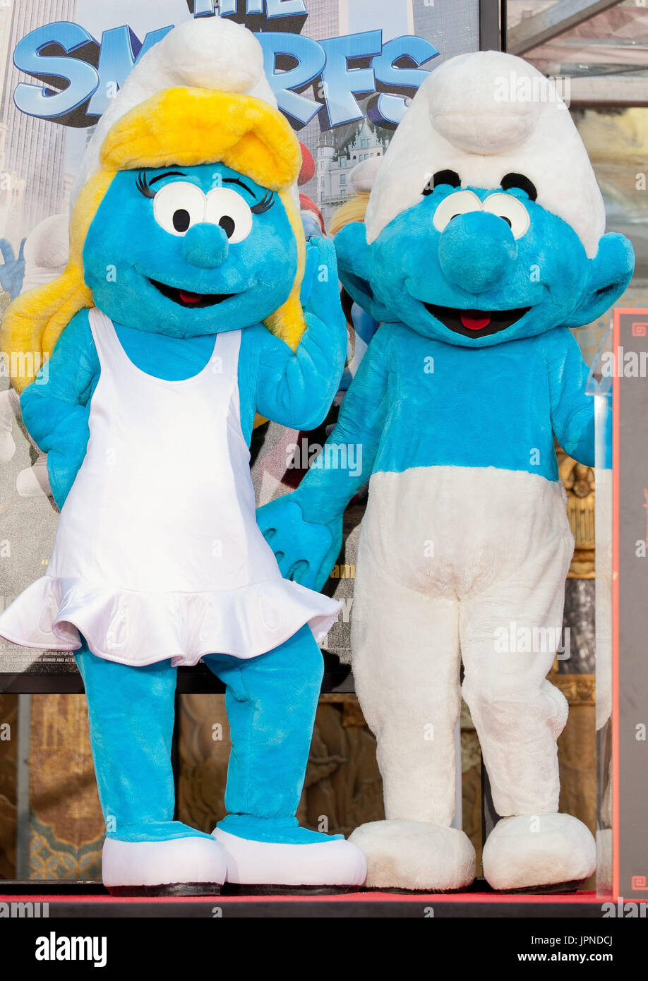 Smurfette & Clumsy Smurf at The Smurfs Hand & Footprint Ceremony held ...