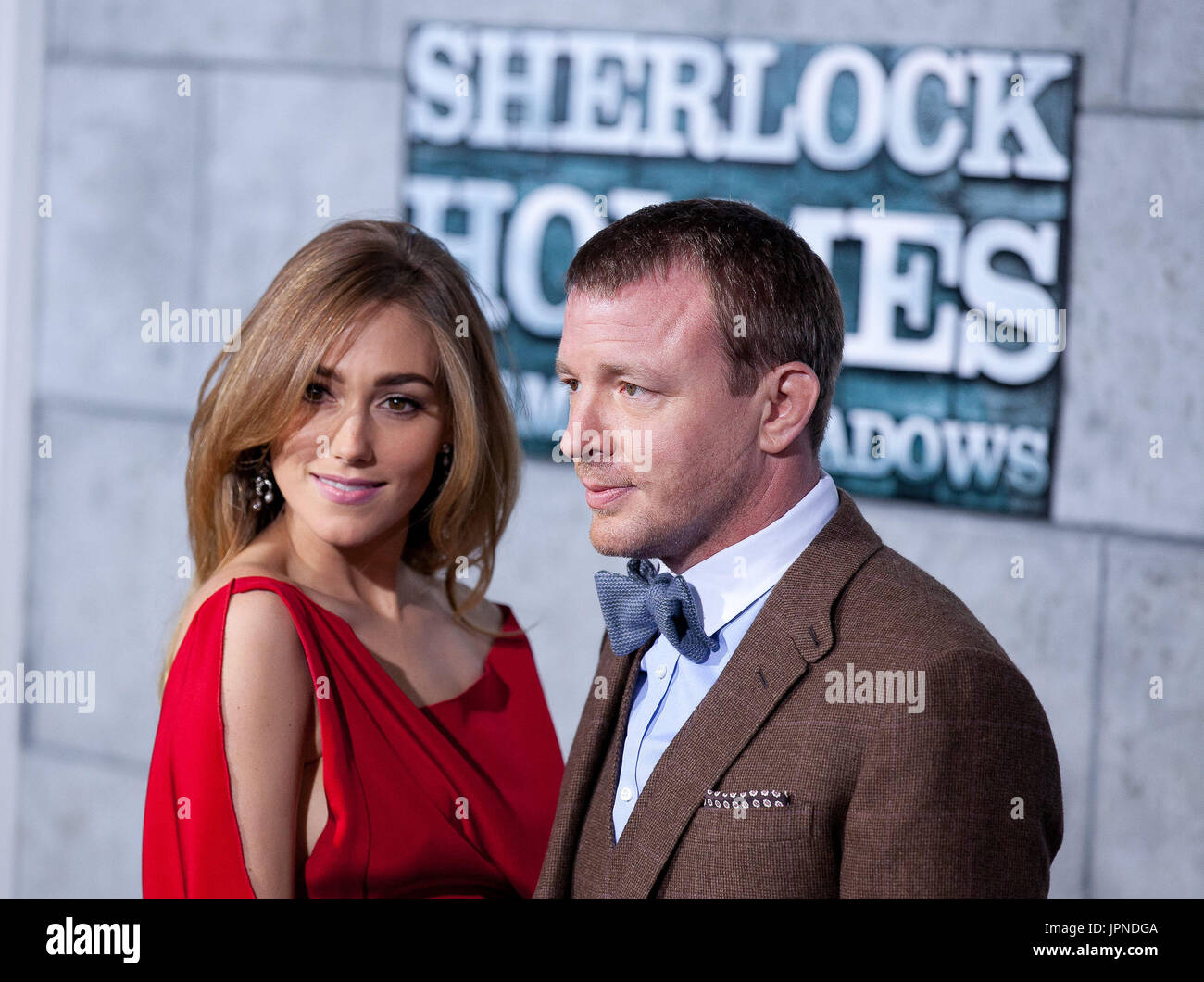 Director Guy Ritchie & girlfriend Jacqui Ainsley at the "Sherlock ...
