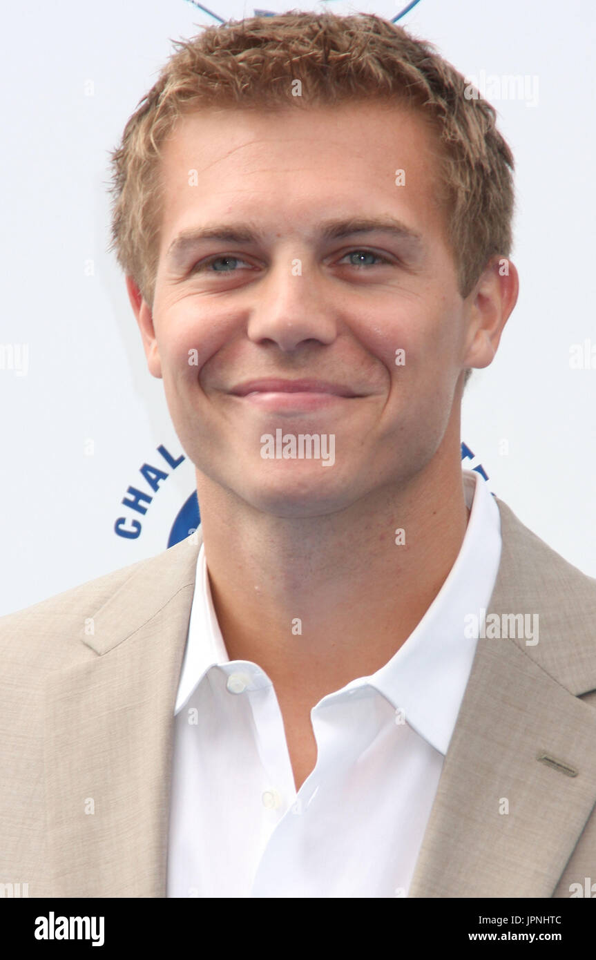Michael Roark at the World Premiere of DOLPHIN TALE held at the Village ...
