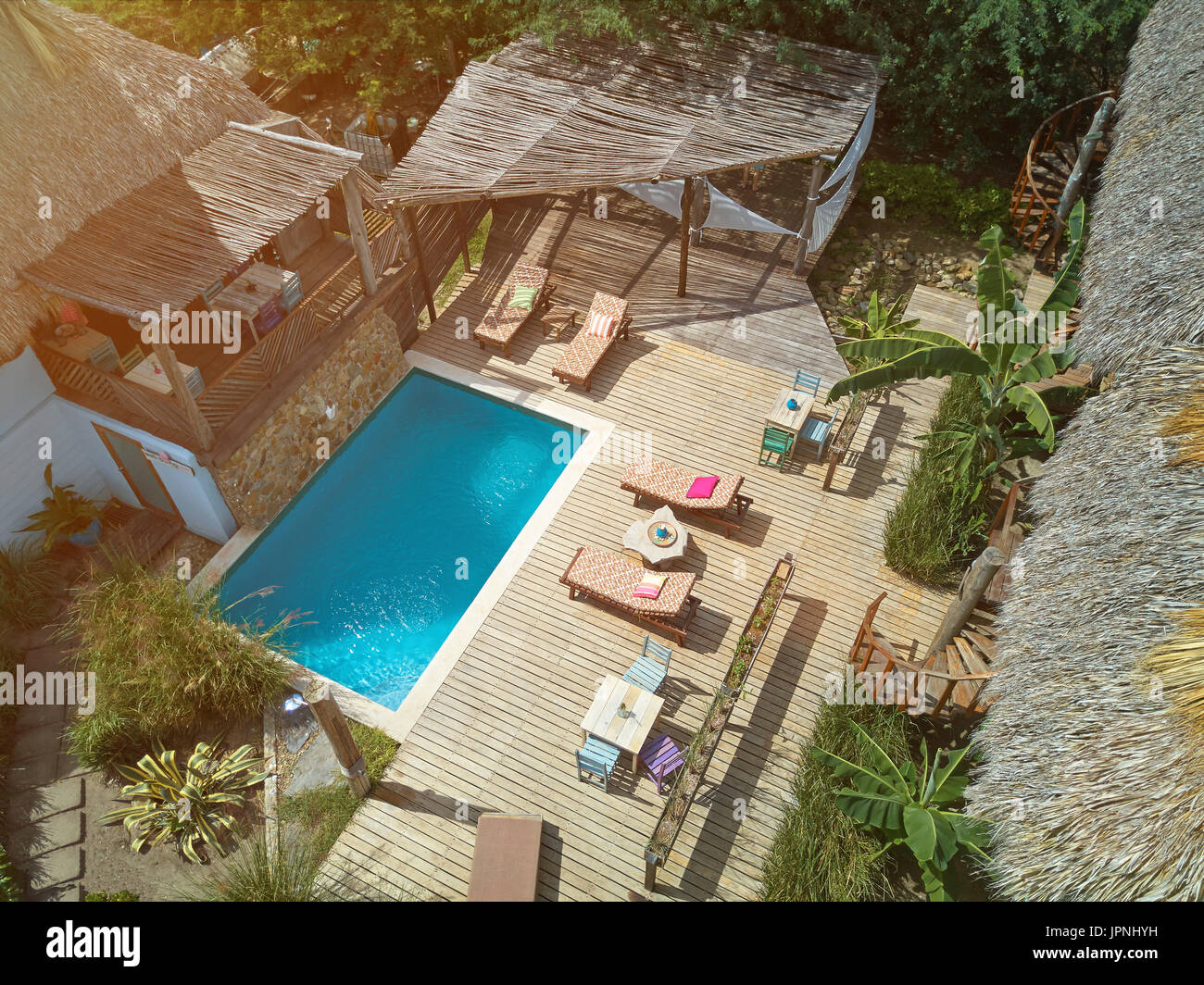 Clean swimming pool in eco lodge. Natural spa resort Stock Photo - Alamy