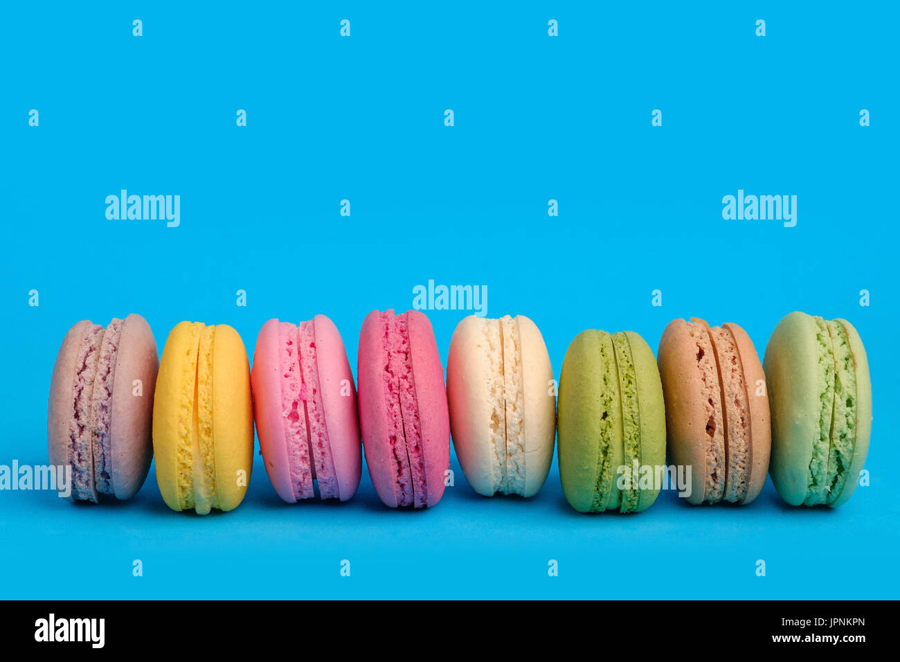 French macaroon cookies on isolated background Stock Photo - Alamy