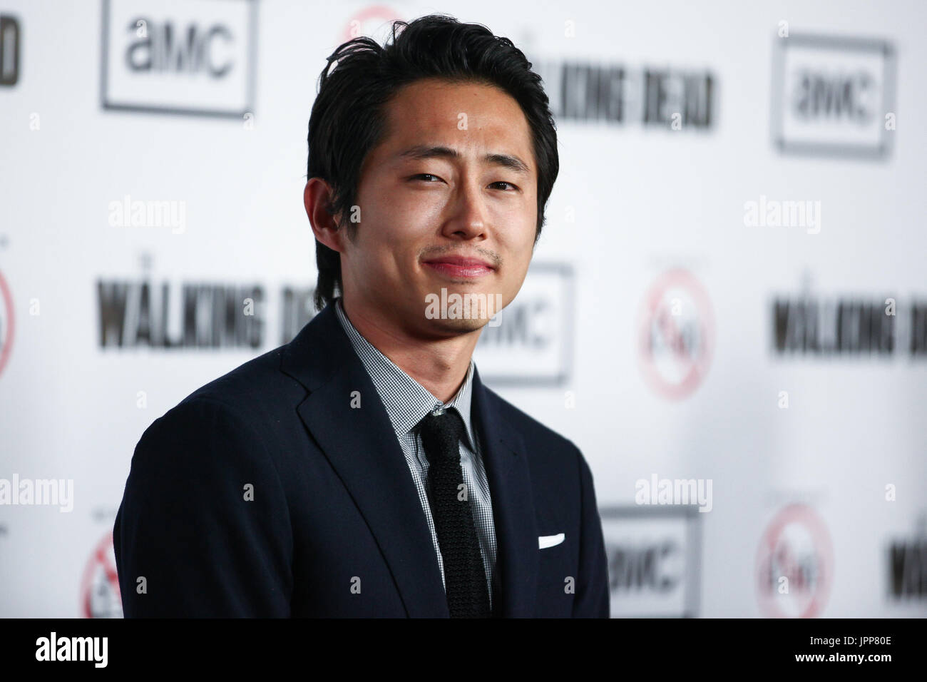 Steven Yeun arrives at the premiere of AMC's 'The Walking Dead' 3rd ...