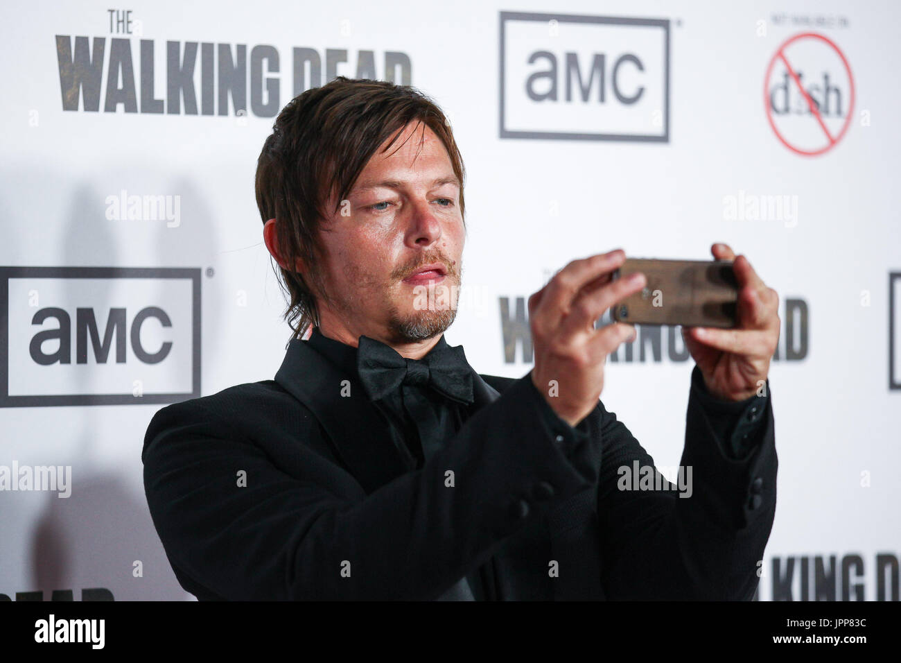 Norman Reedus arrives at the premiere of AMC's 'The Walking Dead' 3rd ...