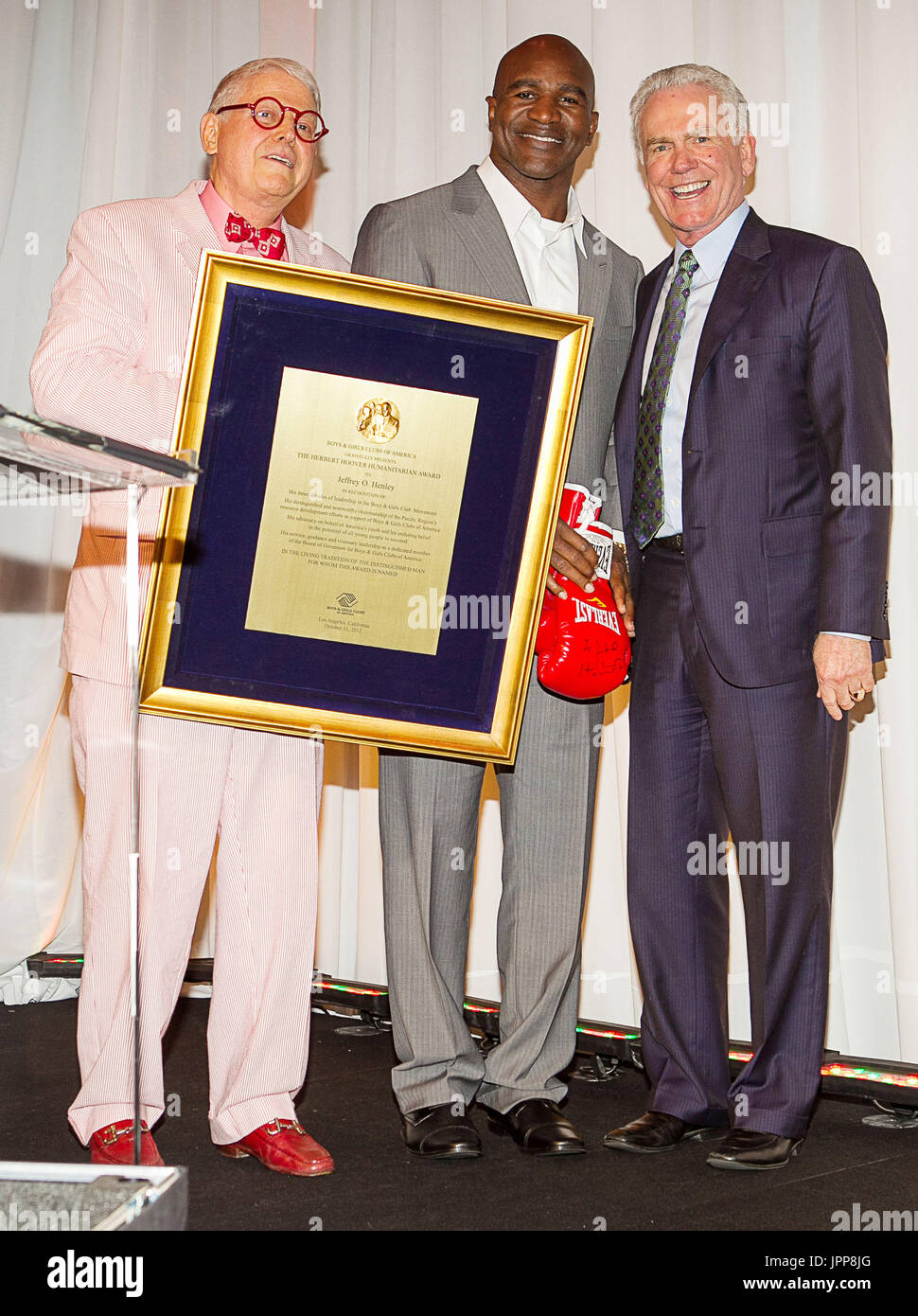 Evander Holyfield & Chairman of Oracle Corporation Jeffrey O. Henley ...