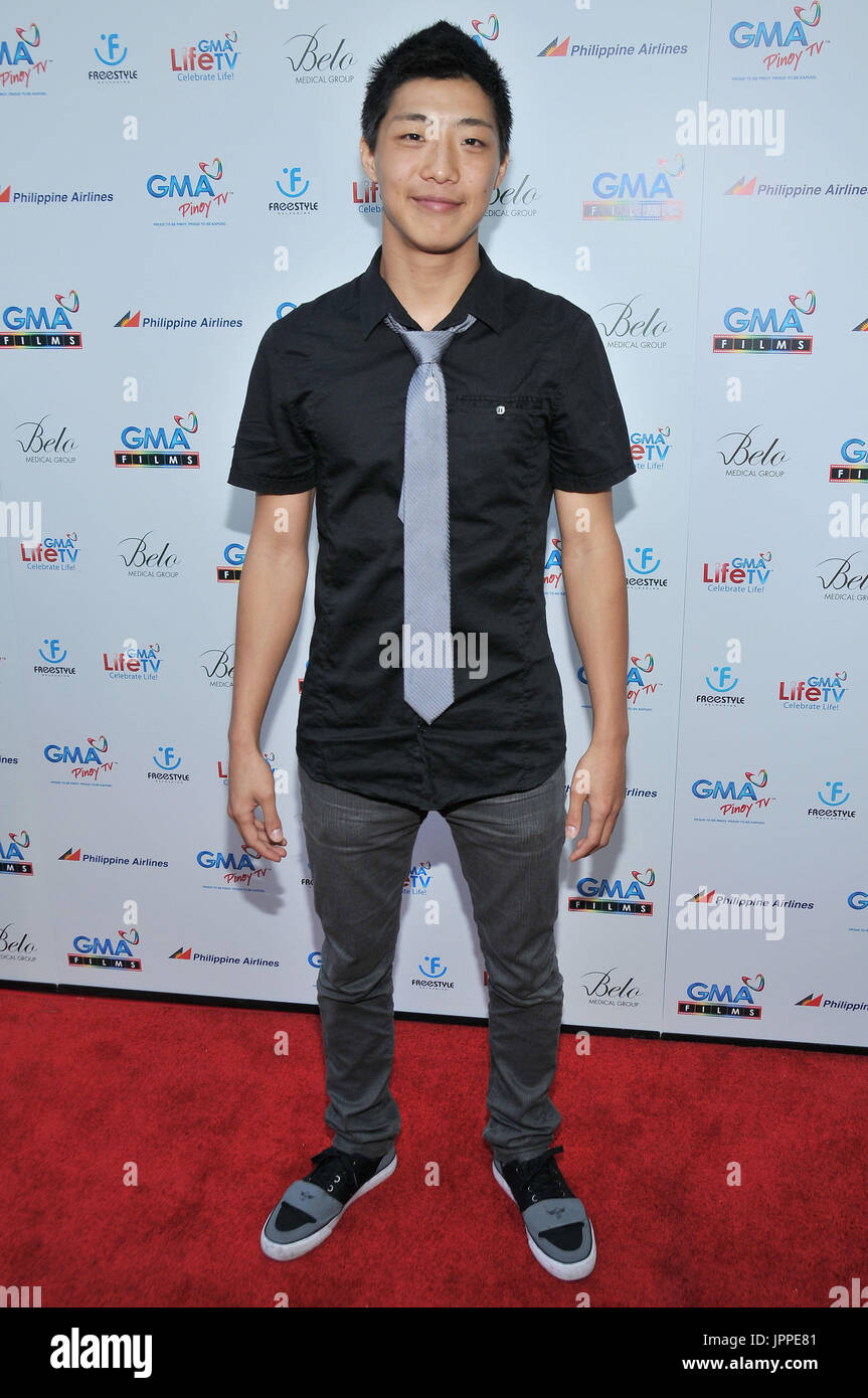Actor Justin Lee at U.S. Premiere of THE ROAD - Arrivals held at the ...