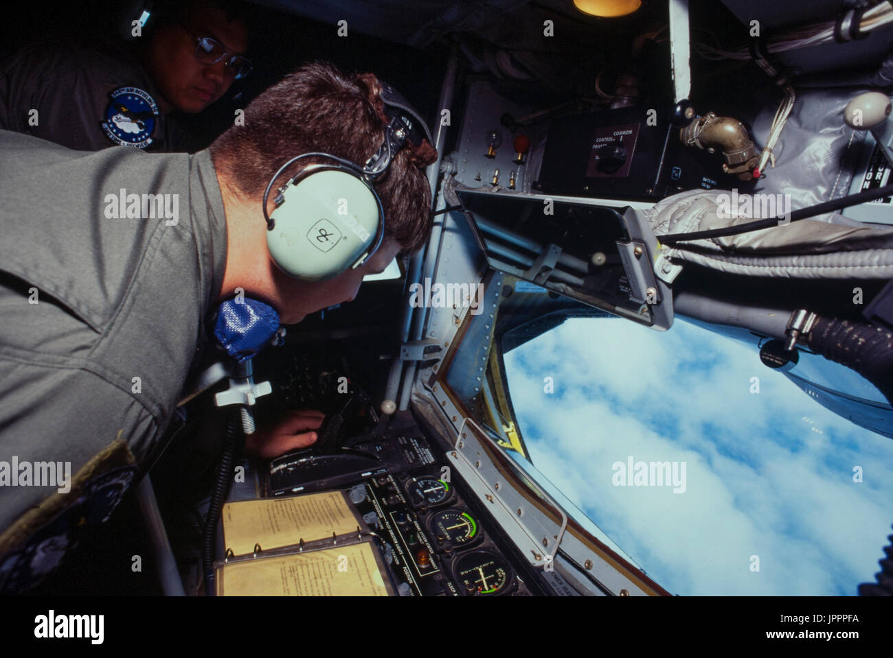 A "boomer" or refueling crew member aboard a U.S. Air Force KC 135 ...