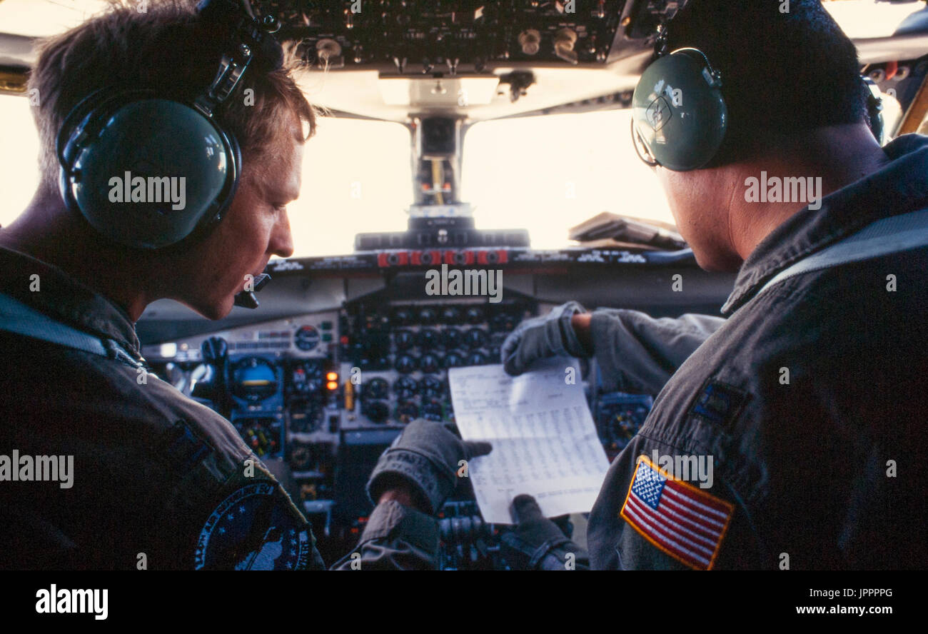 A pilot and co-pilot in flight aboard s U.S. Air Force Boeing KC 135 ...