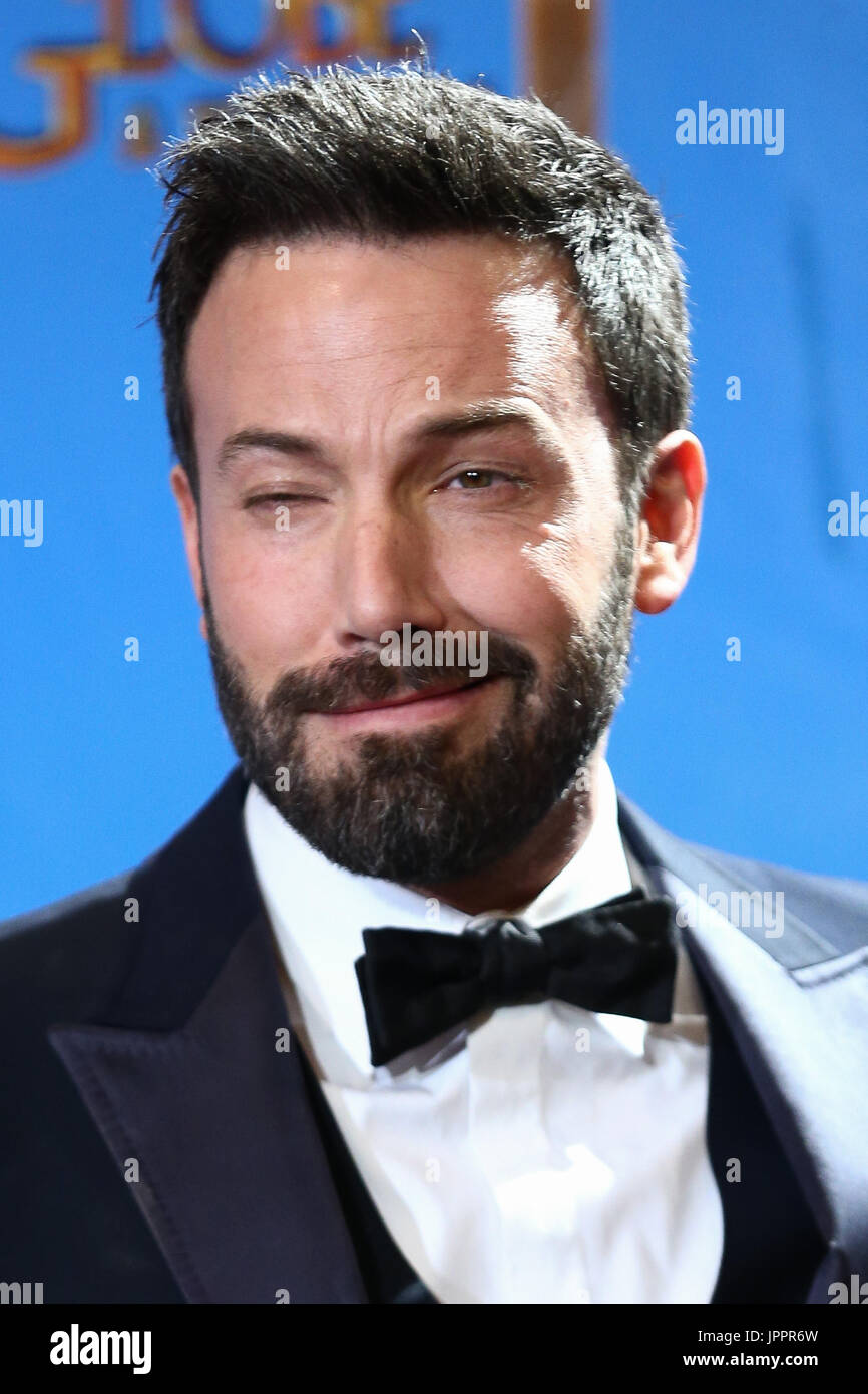 Ben Affleck poses in the press room at the 70th Annual Golden Globe ...
