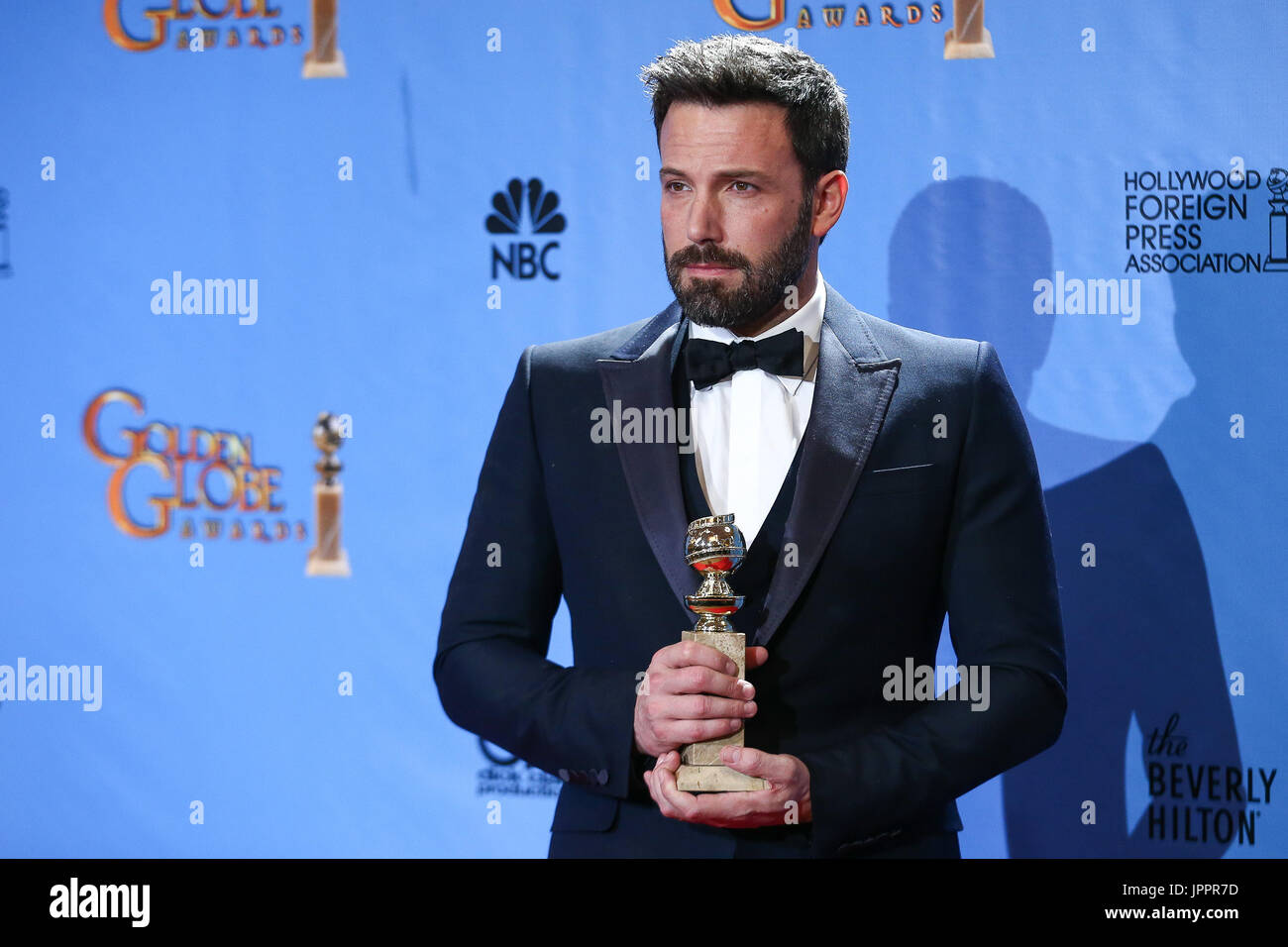 Ben Affleck poses in the press room at the 70th Annual Golden Globe ...